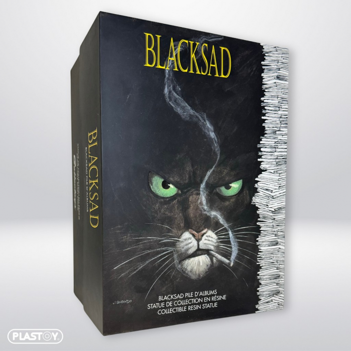 Collectible figurine Plastoy John Blacksad leaning on a stack of comics ...