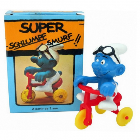 The Smurfs Schleich® Figure - Smurf on the tricycle (40203)